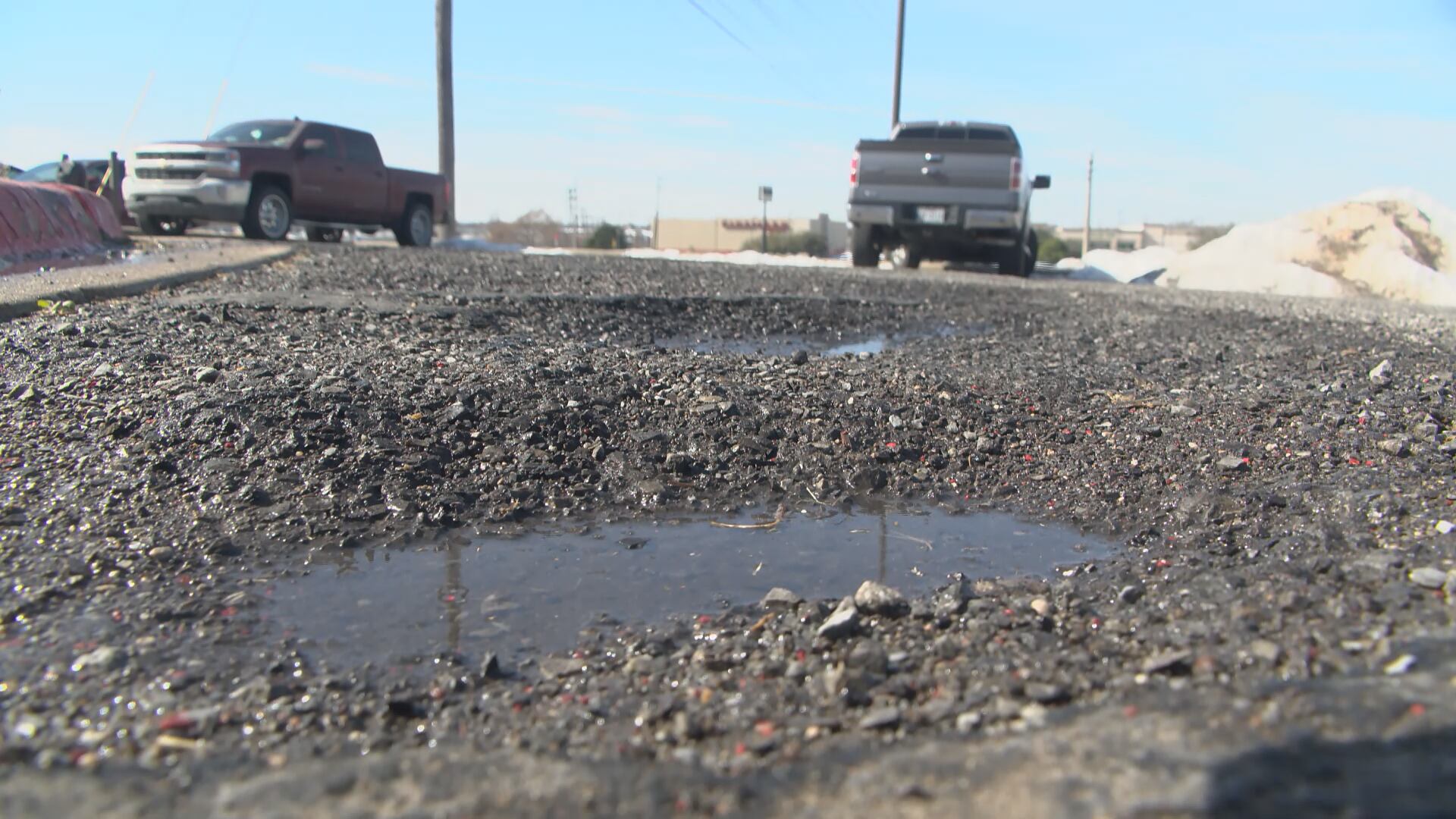 Texas road crews work to fix hundreds of potholes after freeze