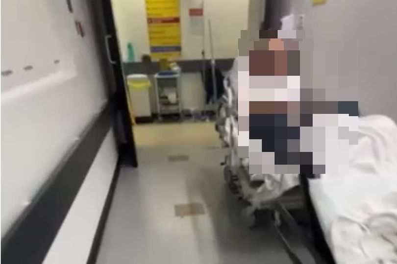 Shocking video shows inside hospital crisis as patients line corridors