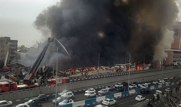 Tehran fire: Iran burns as blaze completely destroys market with smoke ...
