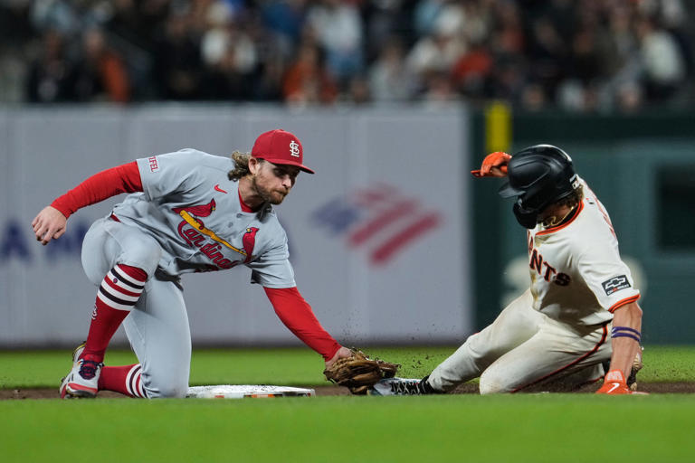 Cards sending Donovan to Seattle in 3-team trade