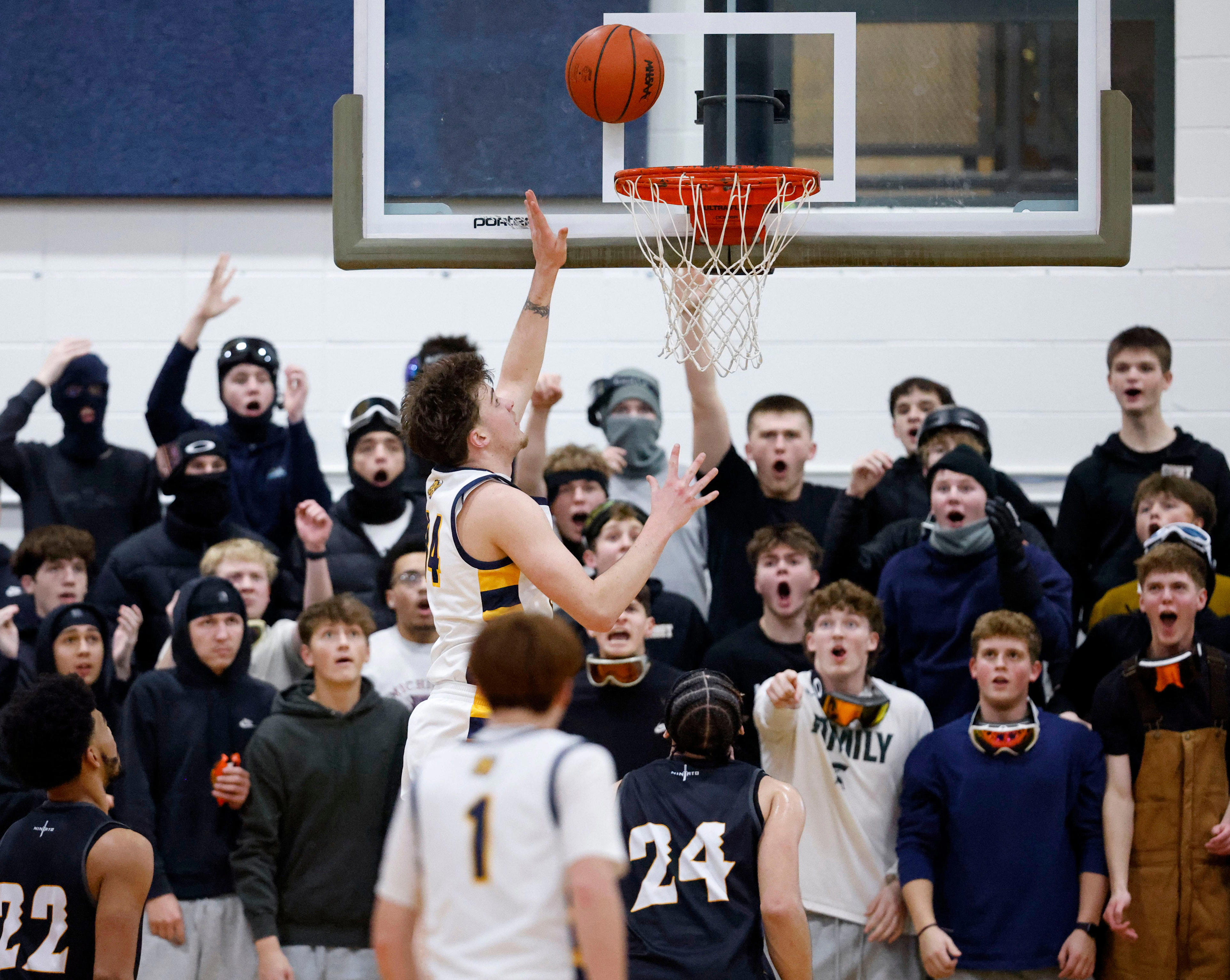 Basketball roundup: Grand Ledge tops Haslett, St. Johns tightens CAAC ...