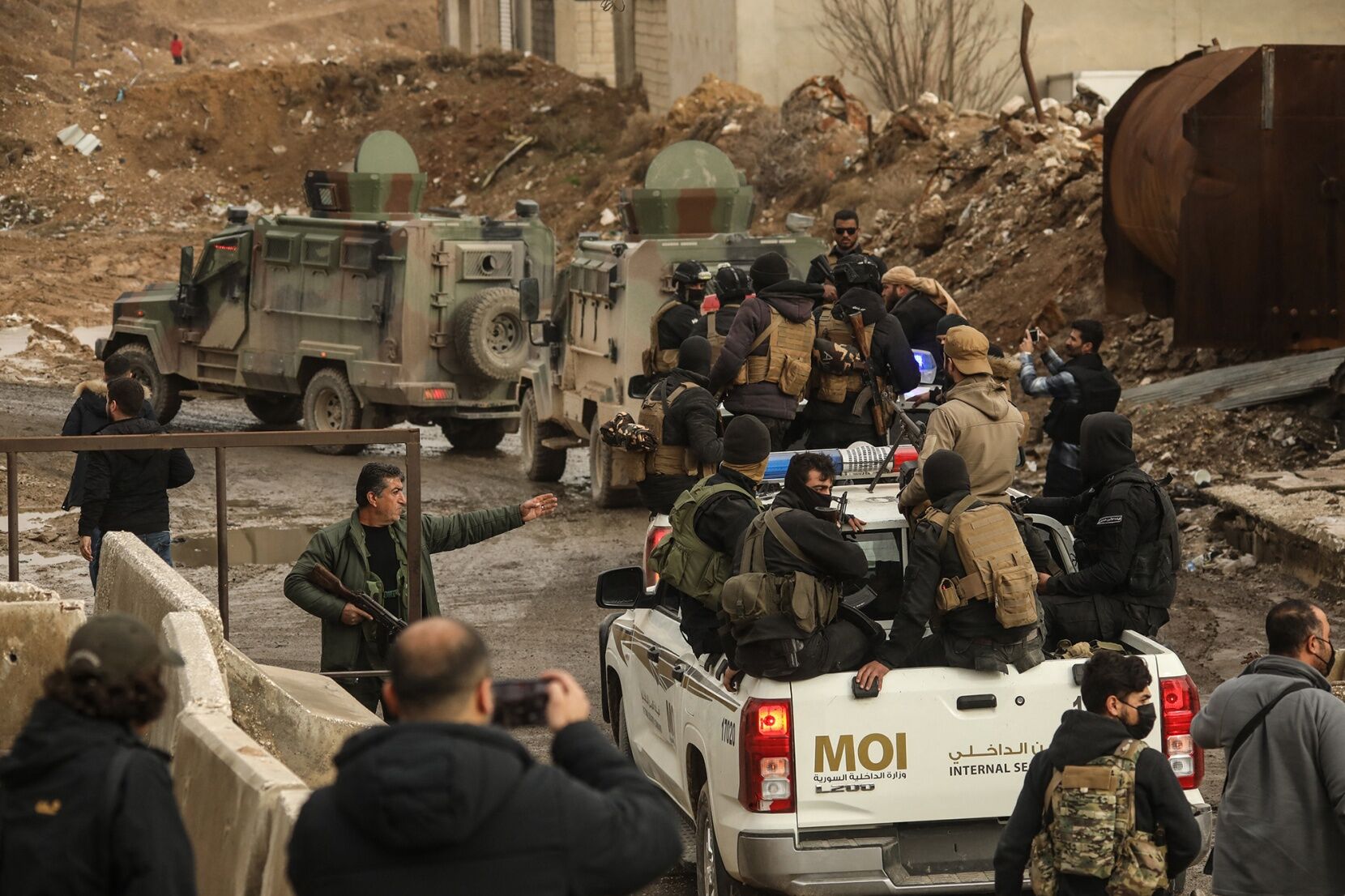 Syria starts taking over Kurdish strongholds on US-backed deal