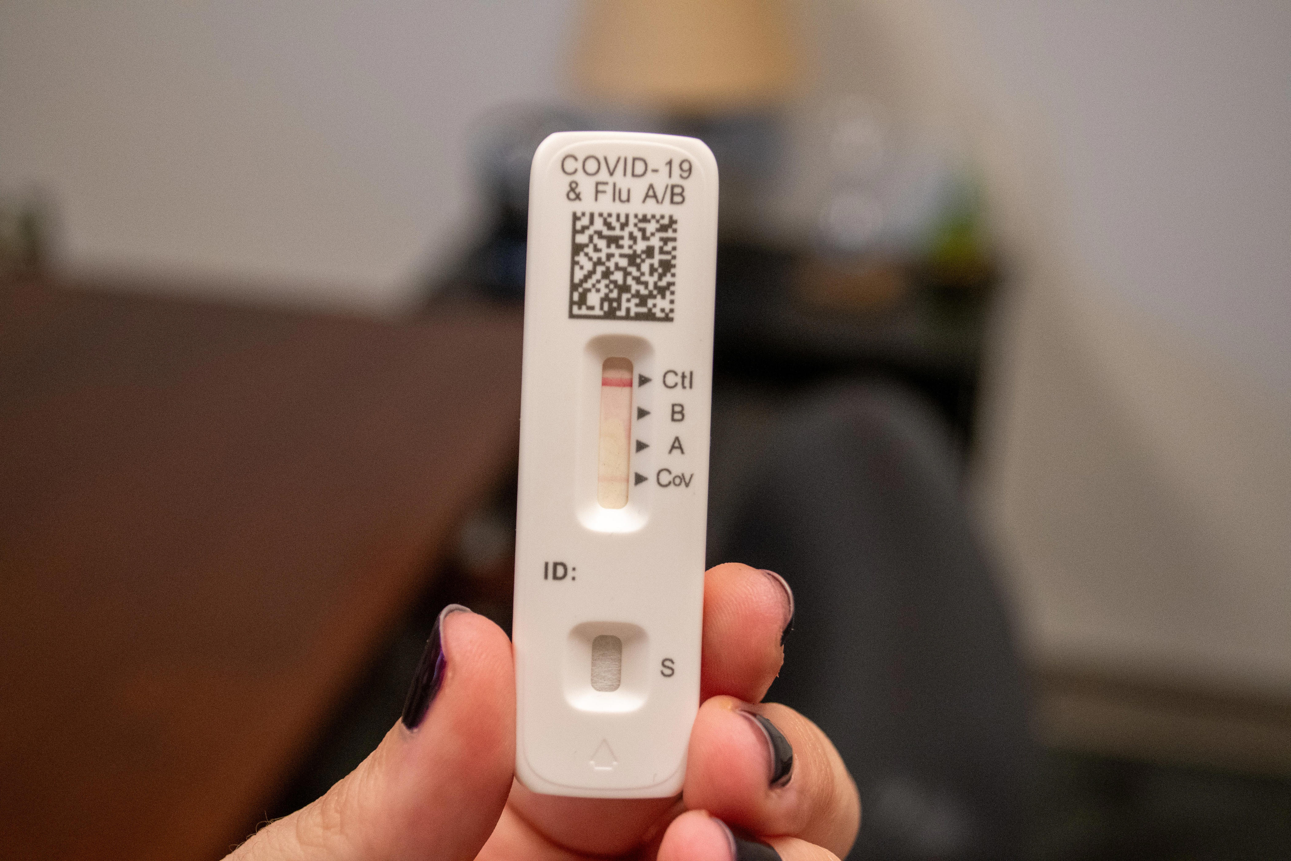 Does a faint line on COVID or flu test count as a negative? What it means