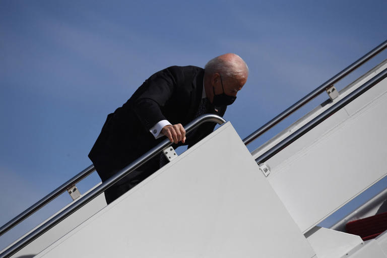 Trump, 79, explains his timid steps down Air Force One stairs
