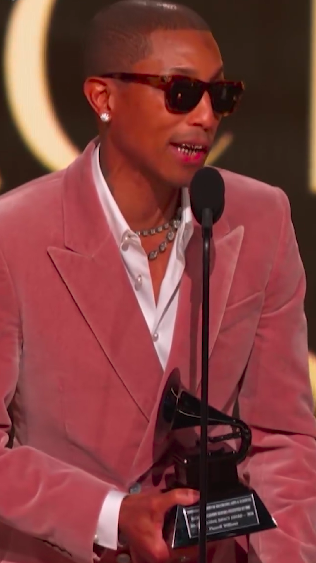 Pharrell Williams receives the Dr. Dre Global Impact Award at the 2026 ...