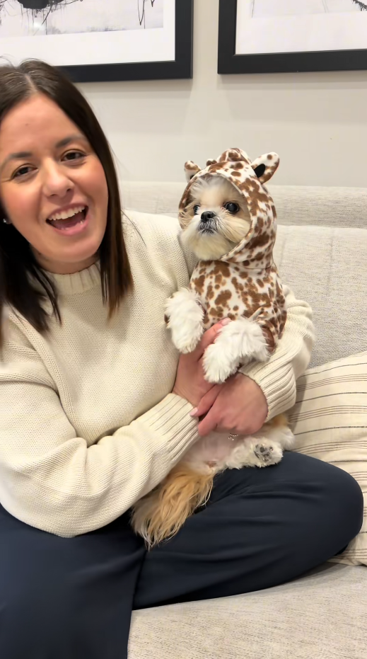 Trying on cozy dog sweaters