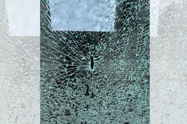 Estate agents 'open for business as usual' after vandals smash window