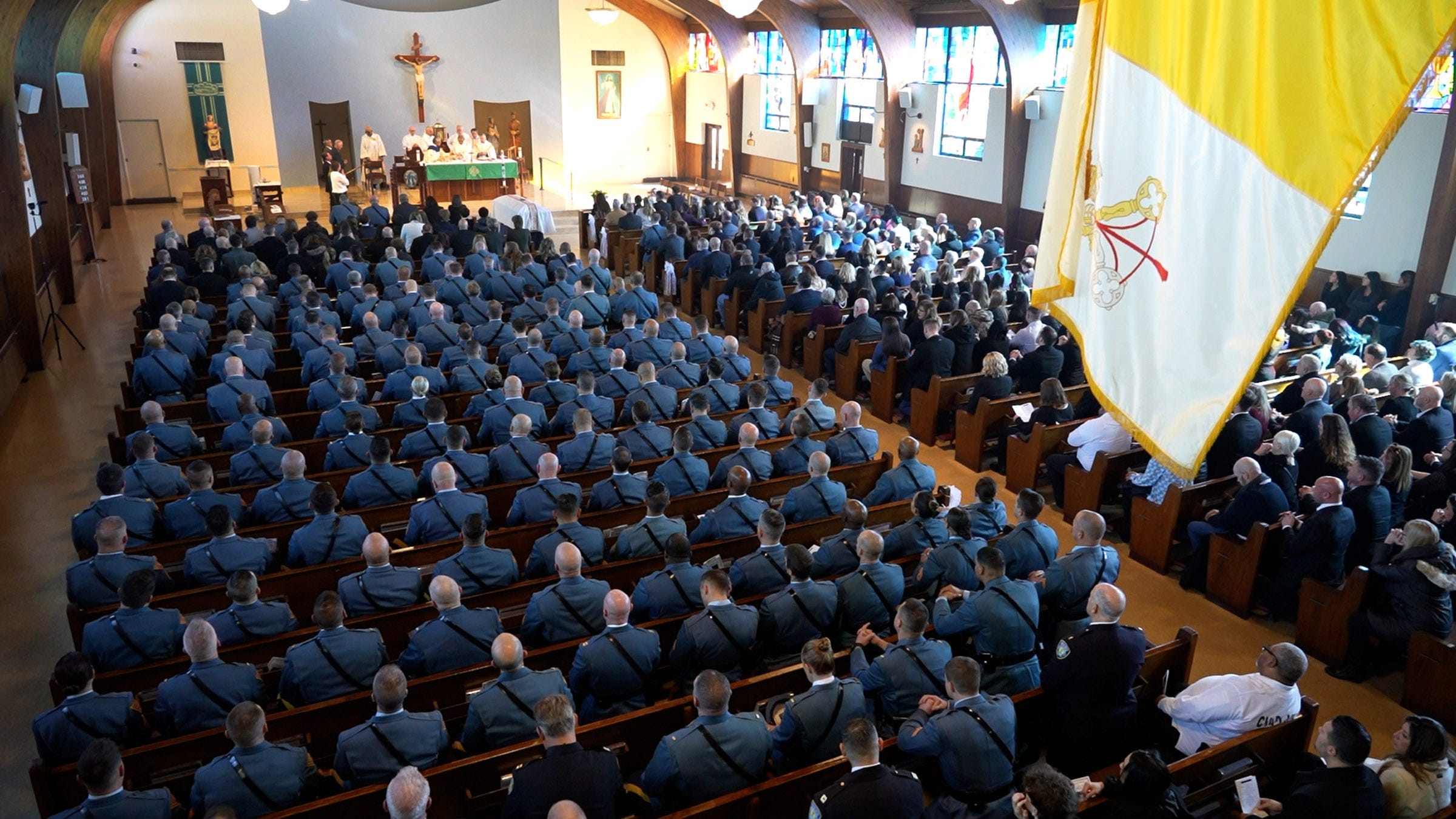 Family, fellow police say goodbye at funeral for Howell state trooper