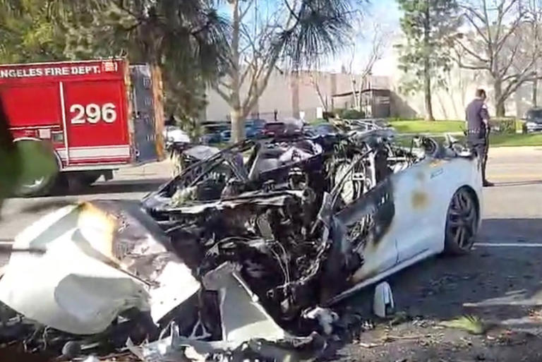 Fiery Tesla crash forces hazmat emergency as 2 hospitalized
