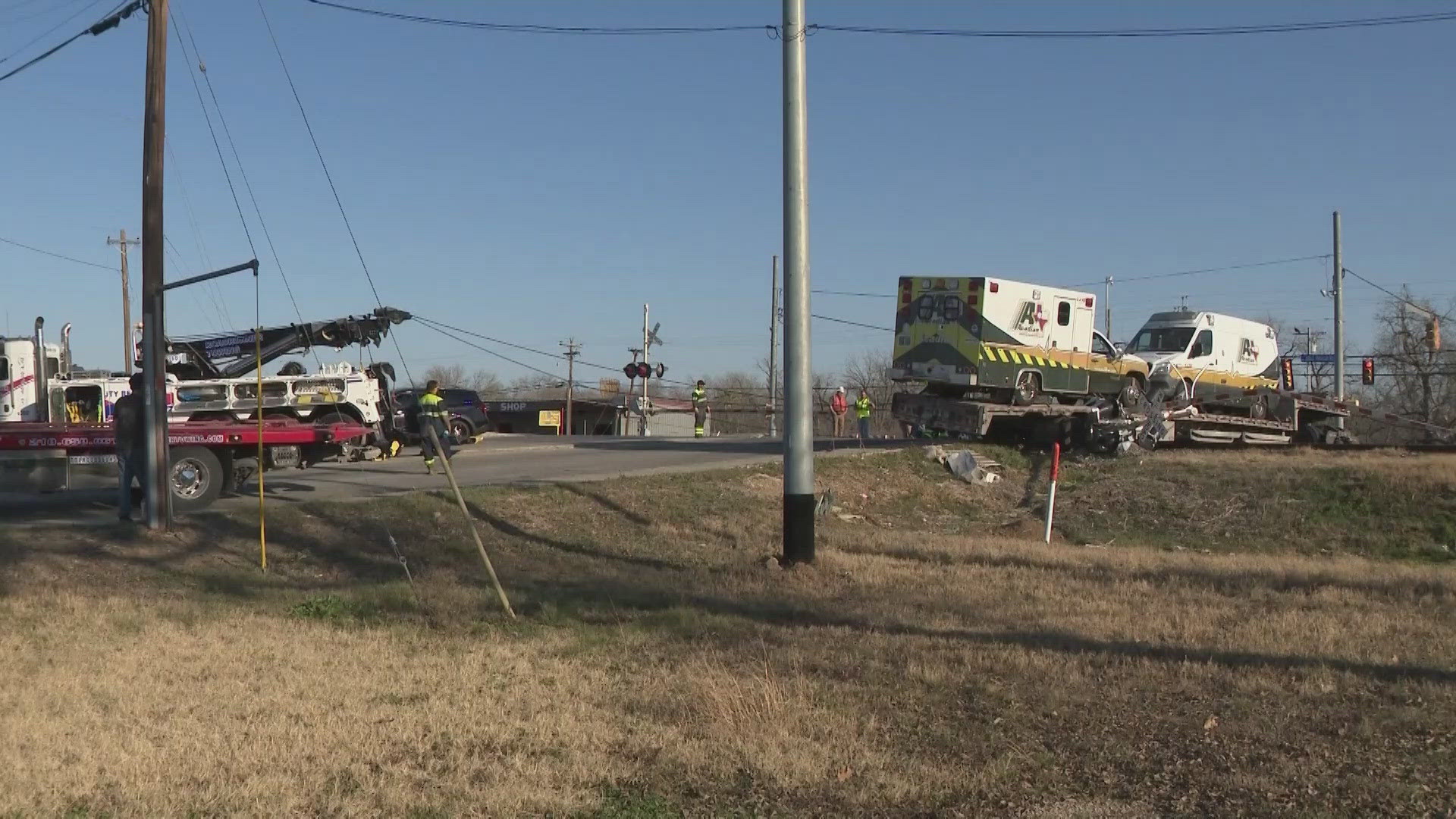 Train collides with 18-wheeler carrying ambulances, causes traffic ...