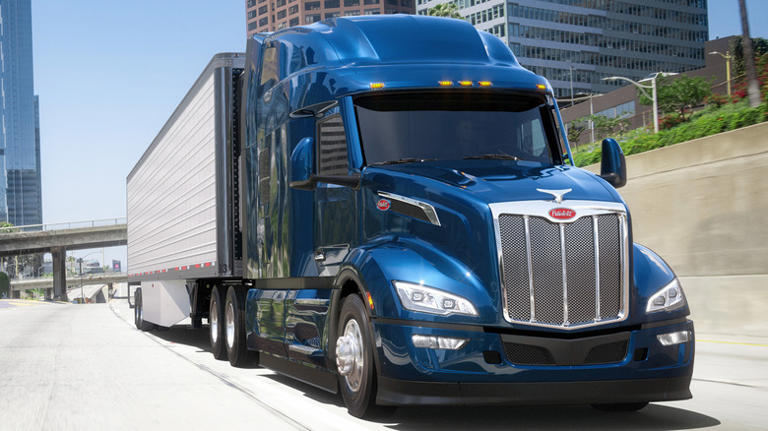 What're the differences between Kenworth and Peterbilt semi trucks?