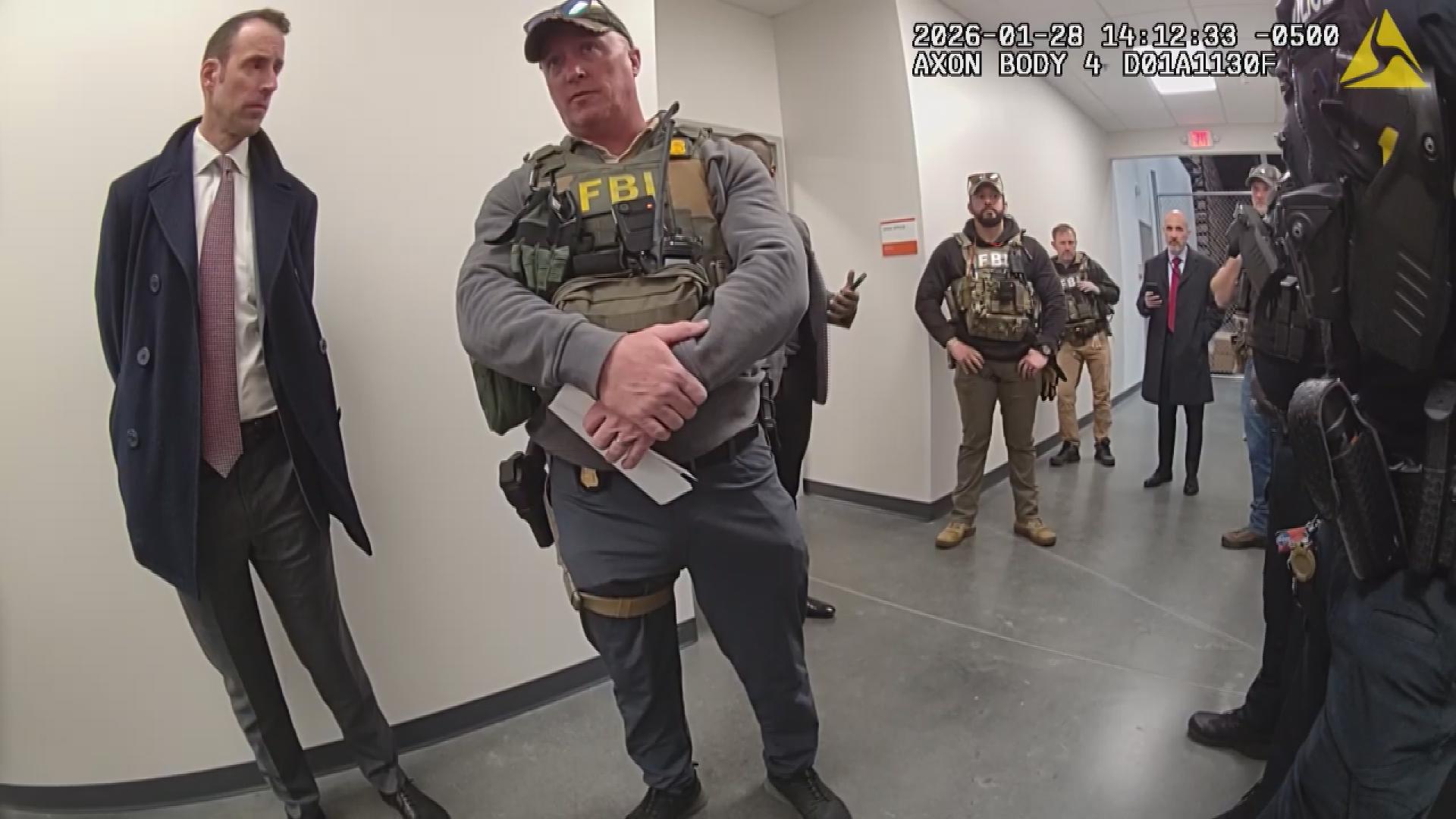 Bodycam video | FBI officials talk with police about warrant served at ...