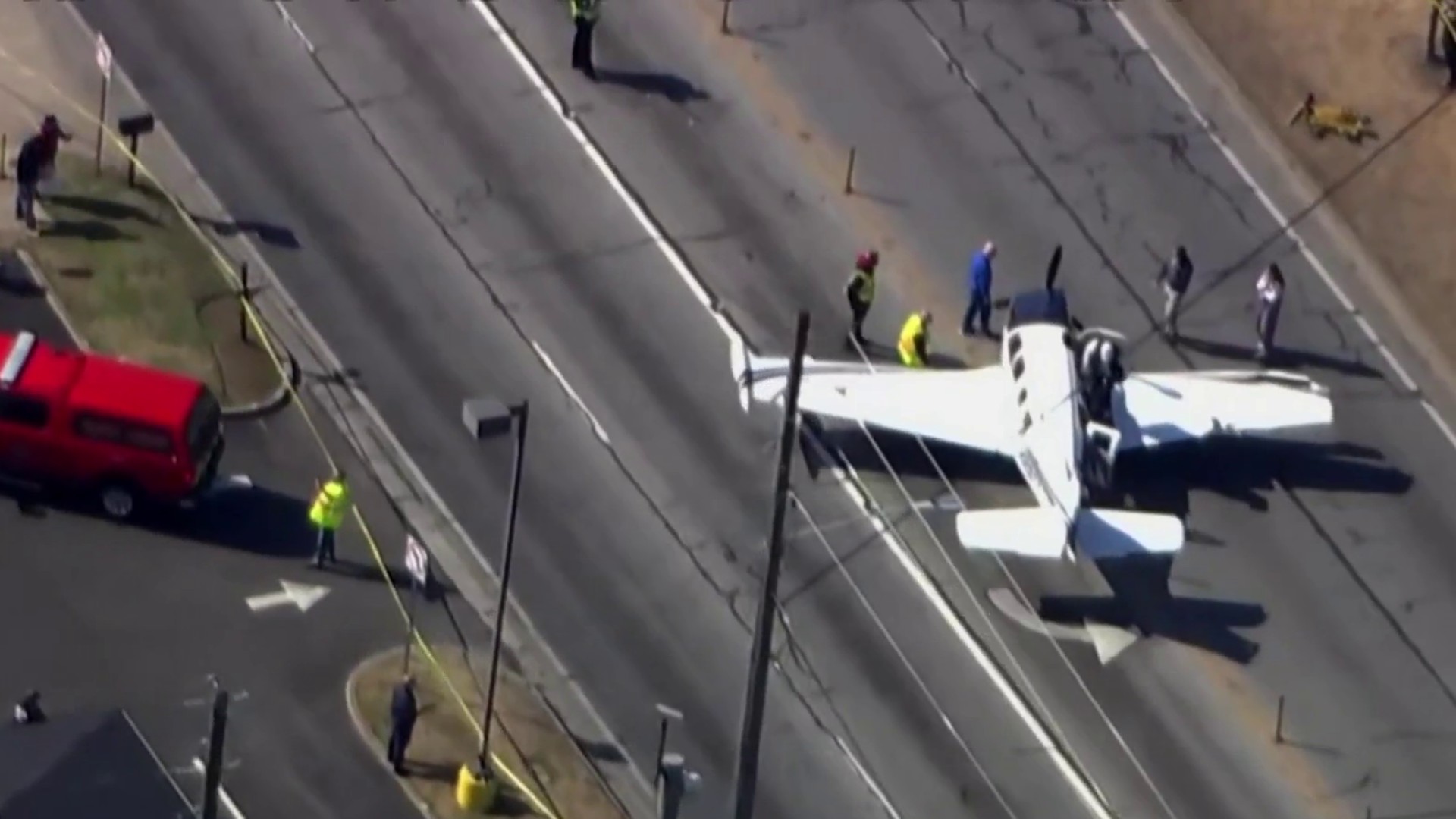 Small plane crash lands on busy Georgia street