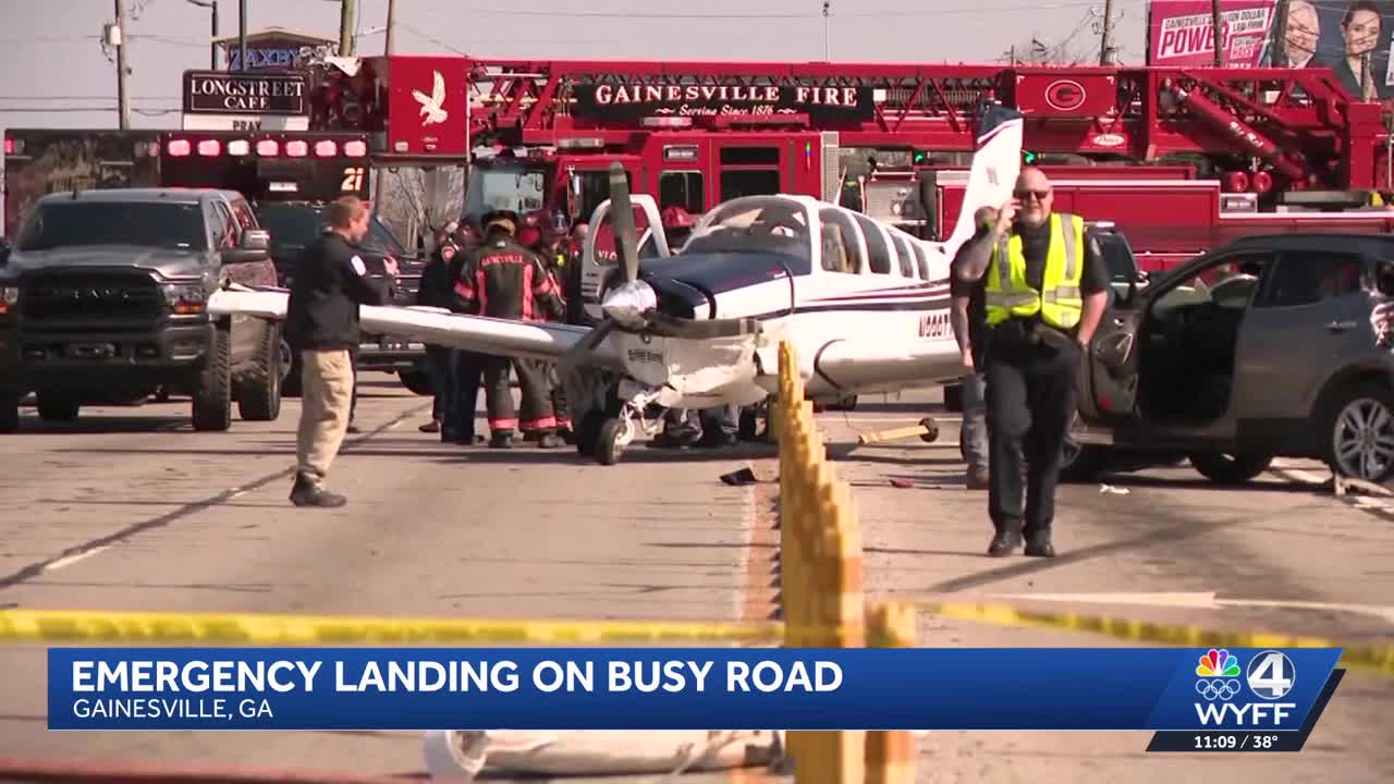 Small plane makes emergency landing in roadway, crashing into several ...