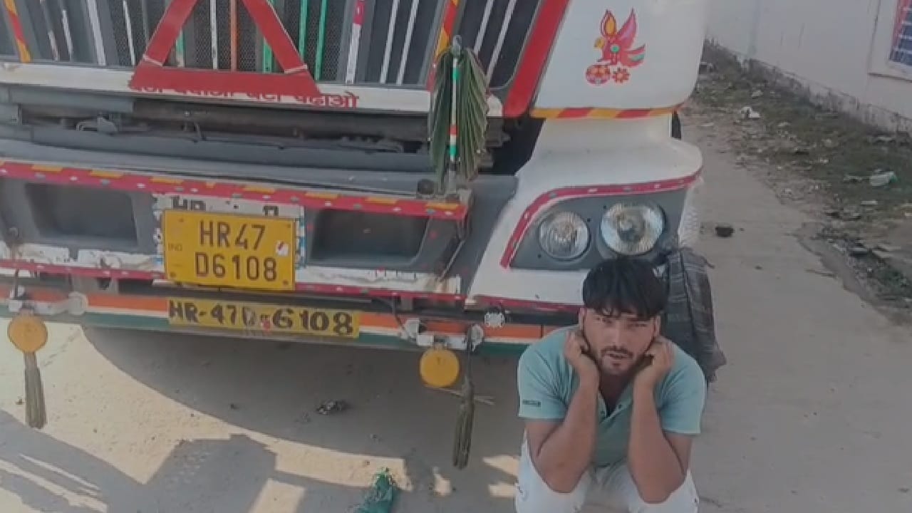 Truck driver arrested over viral video of 'zigzagging' through traffic ...