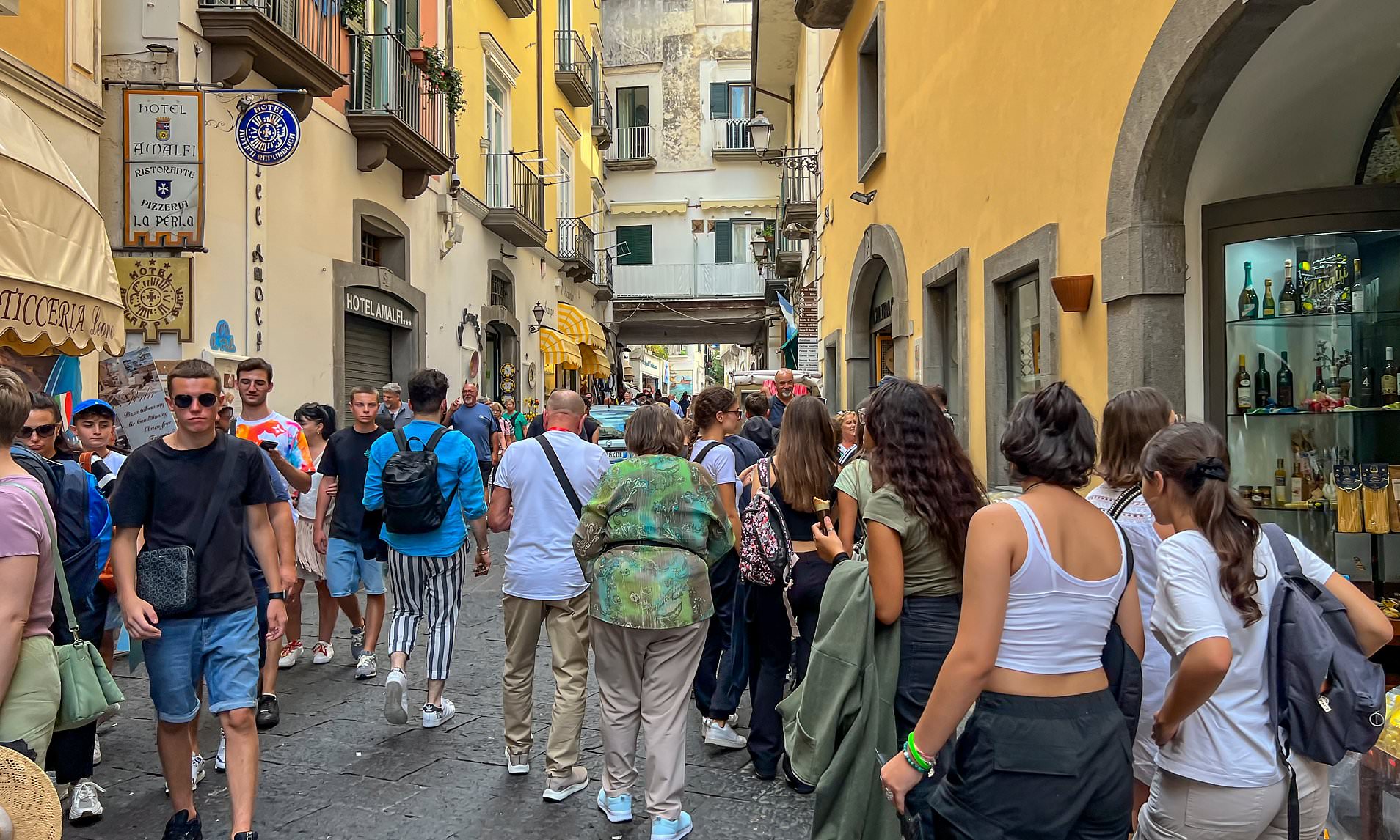 Capri bans loudspeakers and tour guides with umbrellas in fight against ...