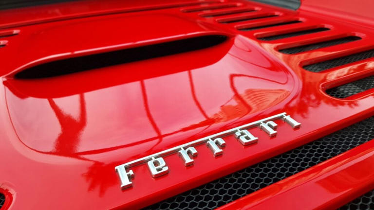 Ferrari unveils its first electric car, designed by former Apple design ...