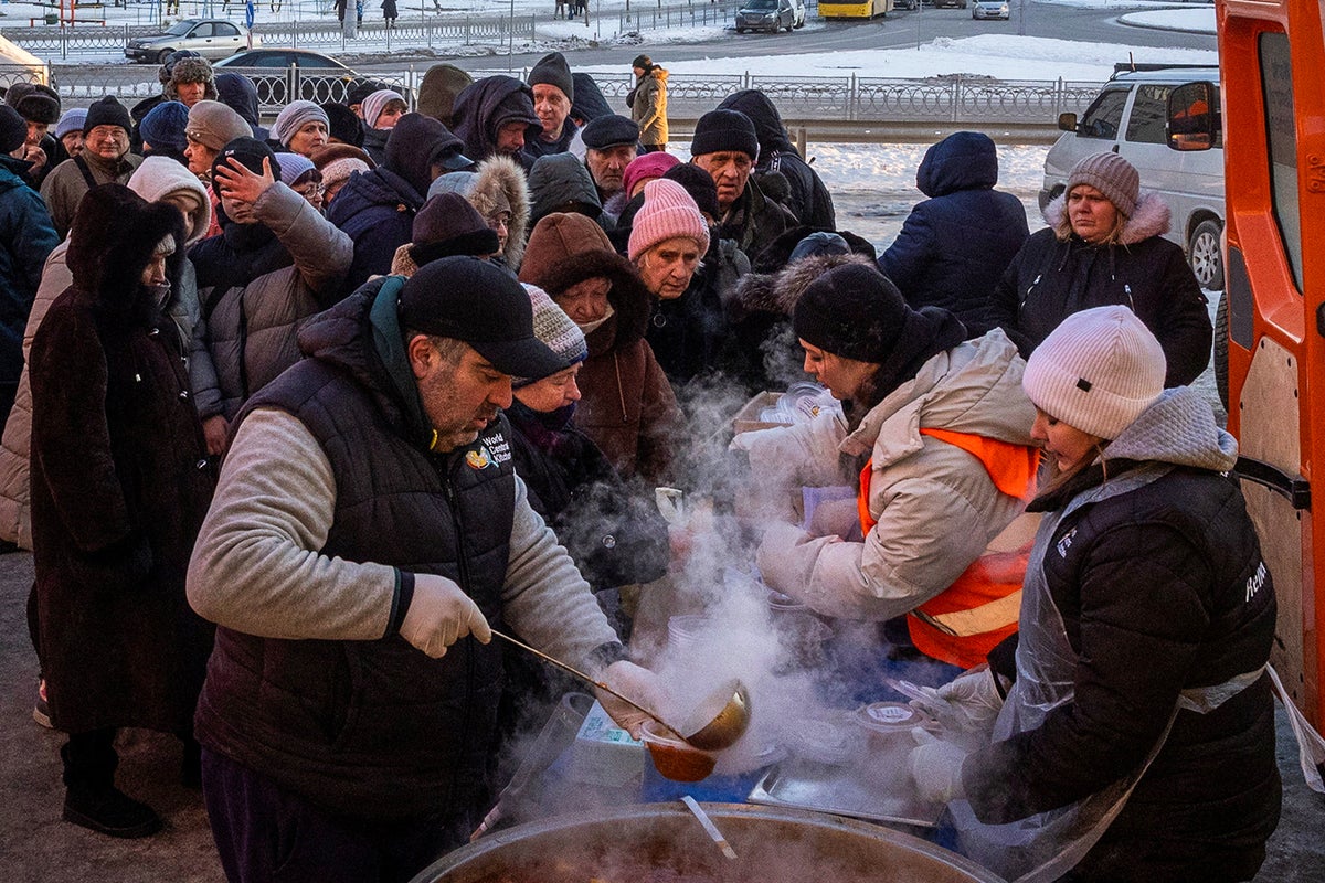Struggling to feed their freezing children, Ukrainians pray for peace