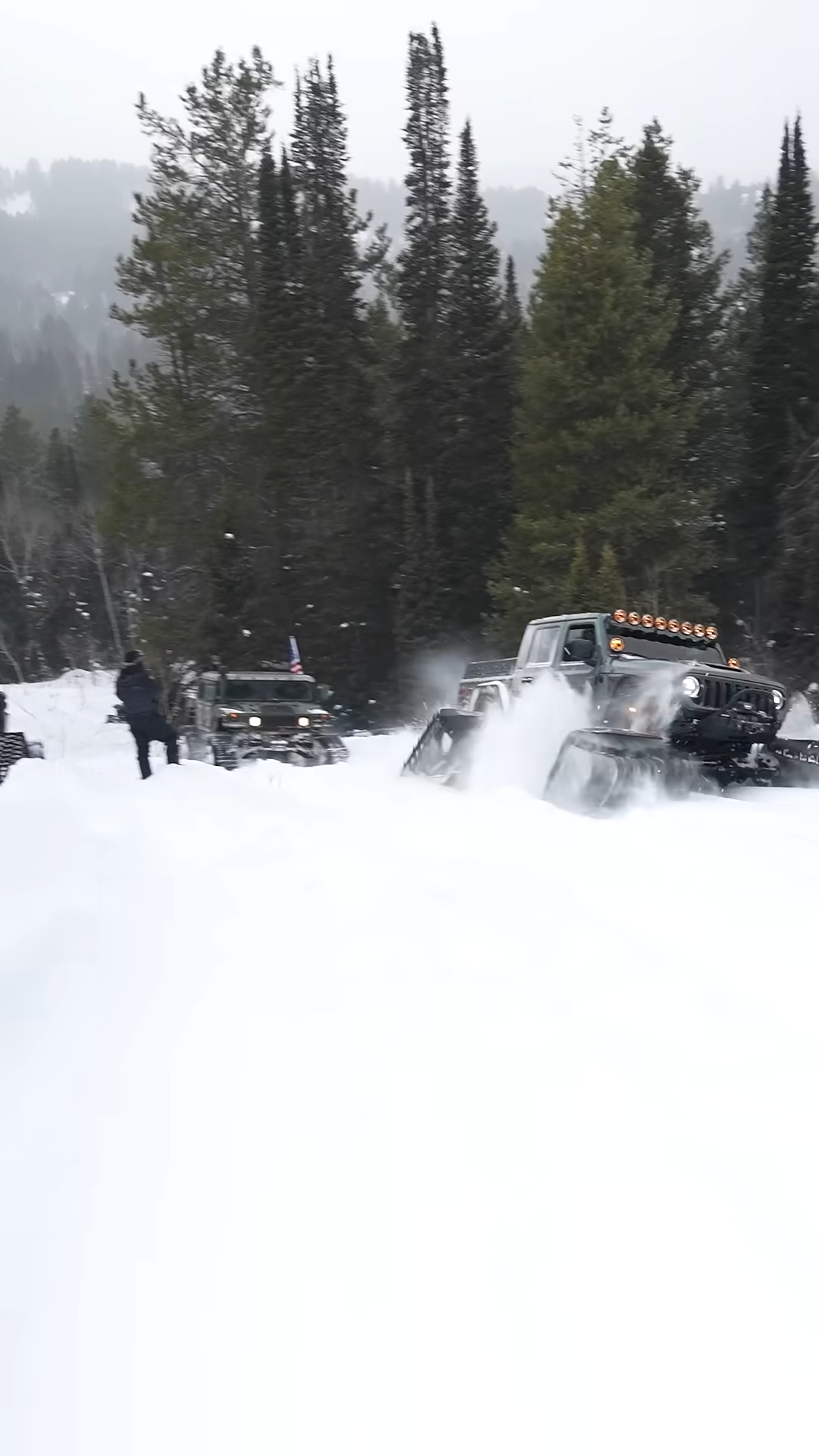 Rescuing a tracked Humvee in deep snow