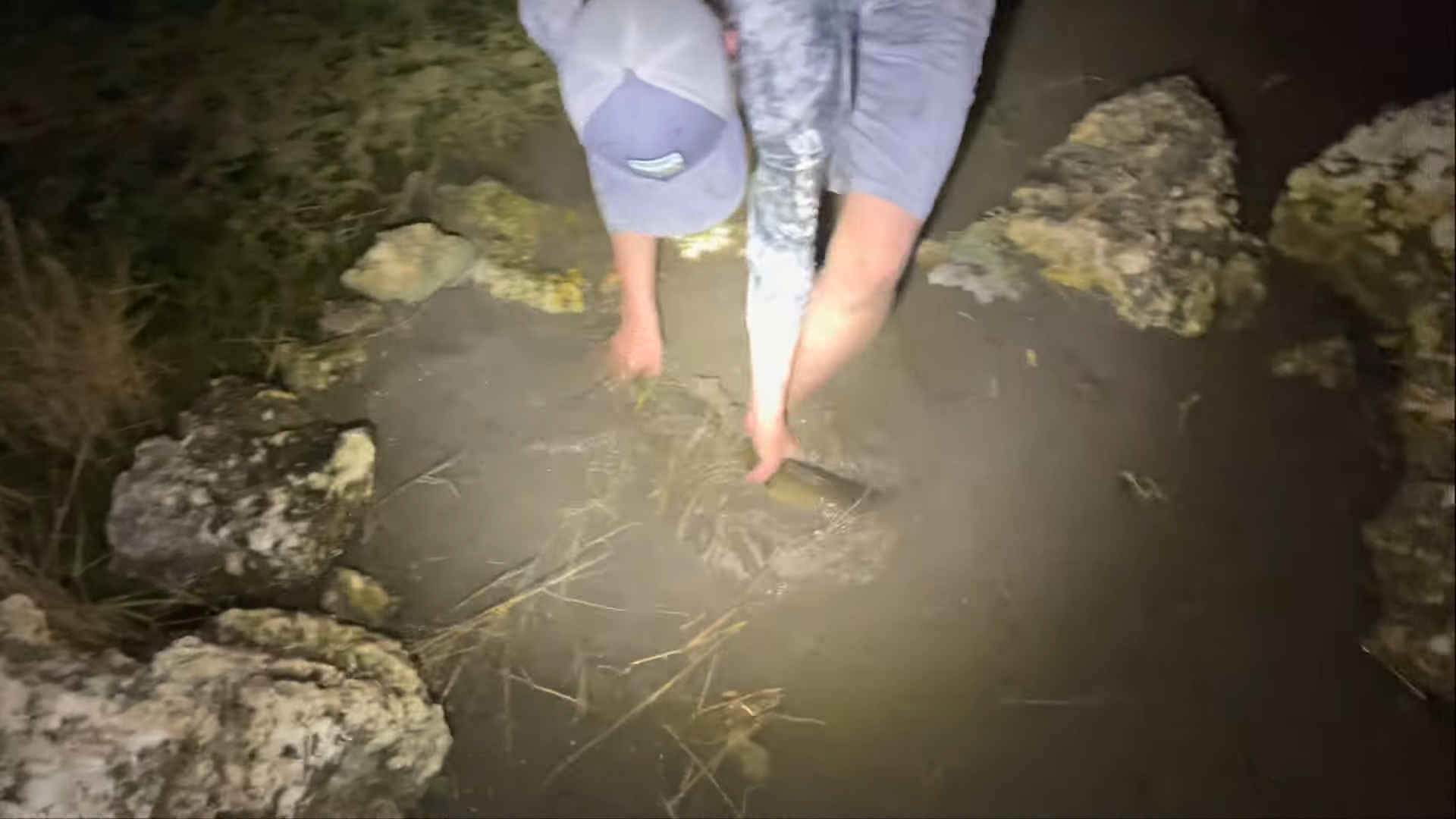 We built a primitive fish trap in the dark and it got real