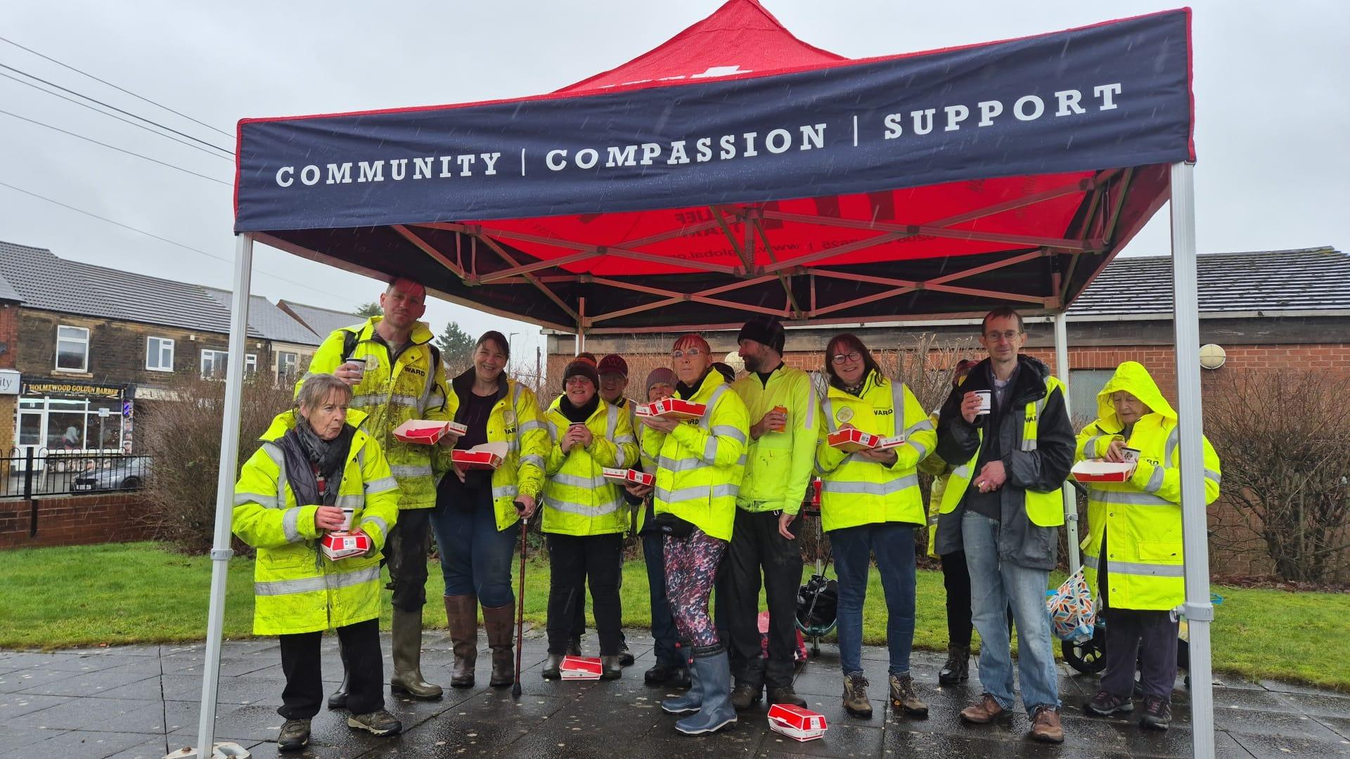 In pictures: Determined volunteers brave pouring rain to clean ...
