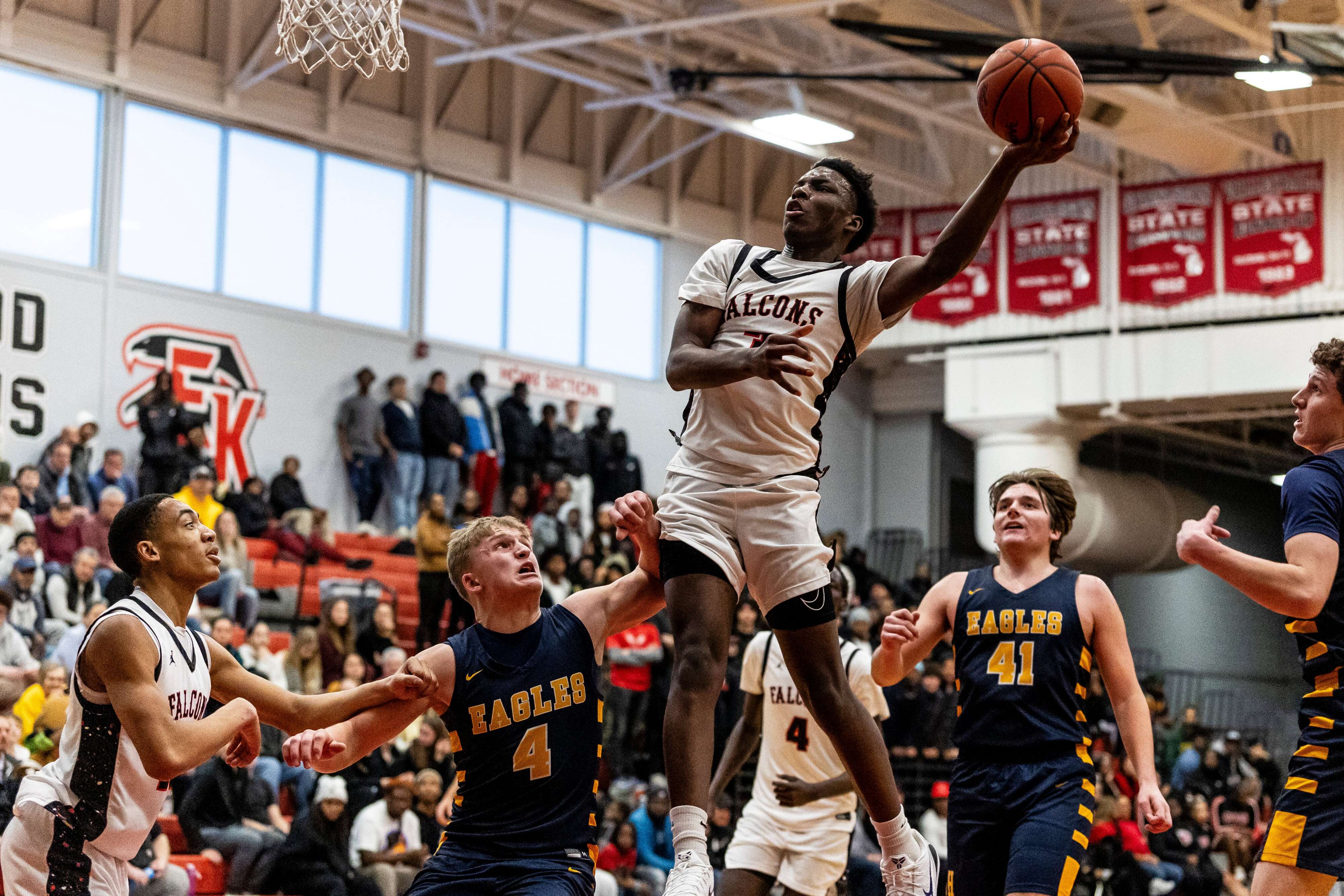 See action as East Kentwood outpaces Hudsonville in boys high school ...