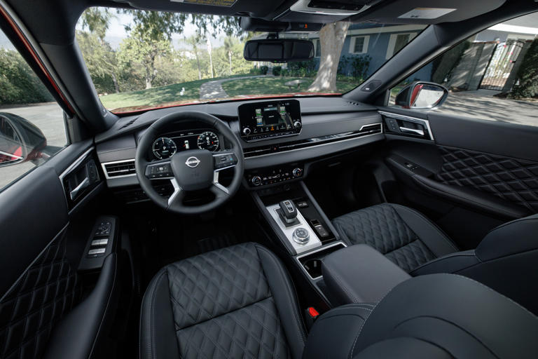 Nissan’s rebadged hybrid SUV costs thousands more than the model it’s ...