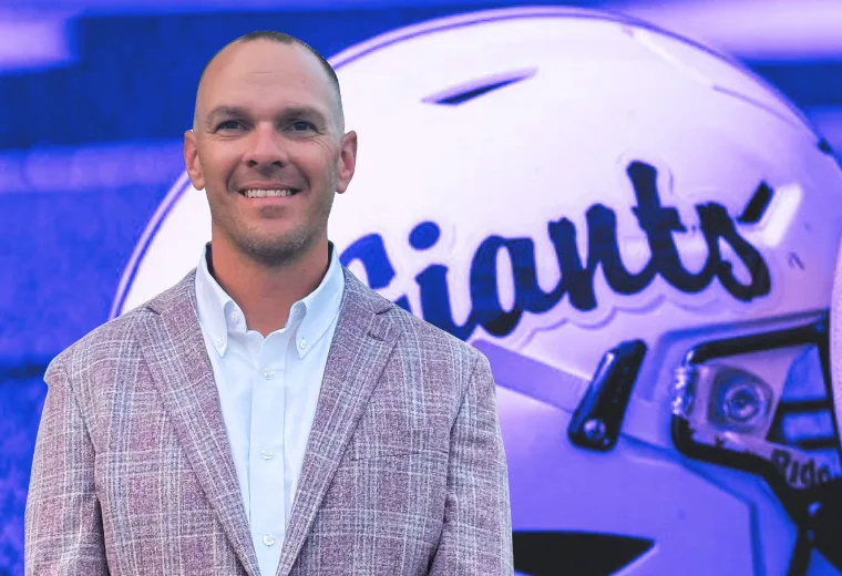 Ben Davis hires Brett Cooper as head football coach