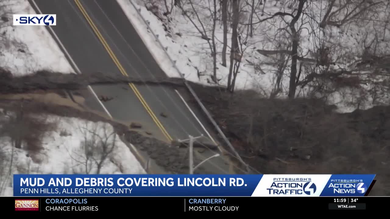 Mud and debris cover road in Penn Hills, Pennsylvania