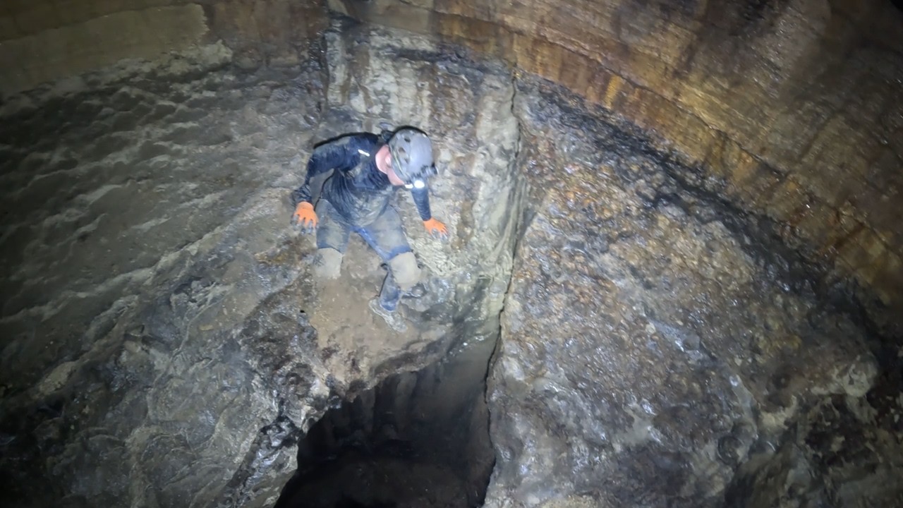 He was hanging over a pit when his friend grabbed him