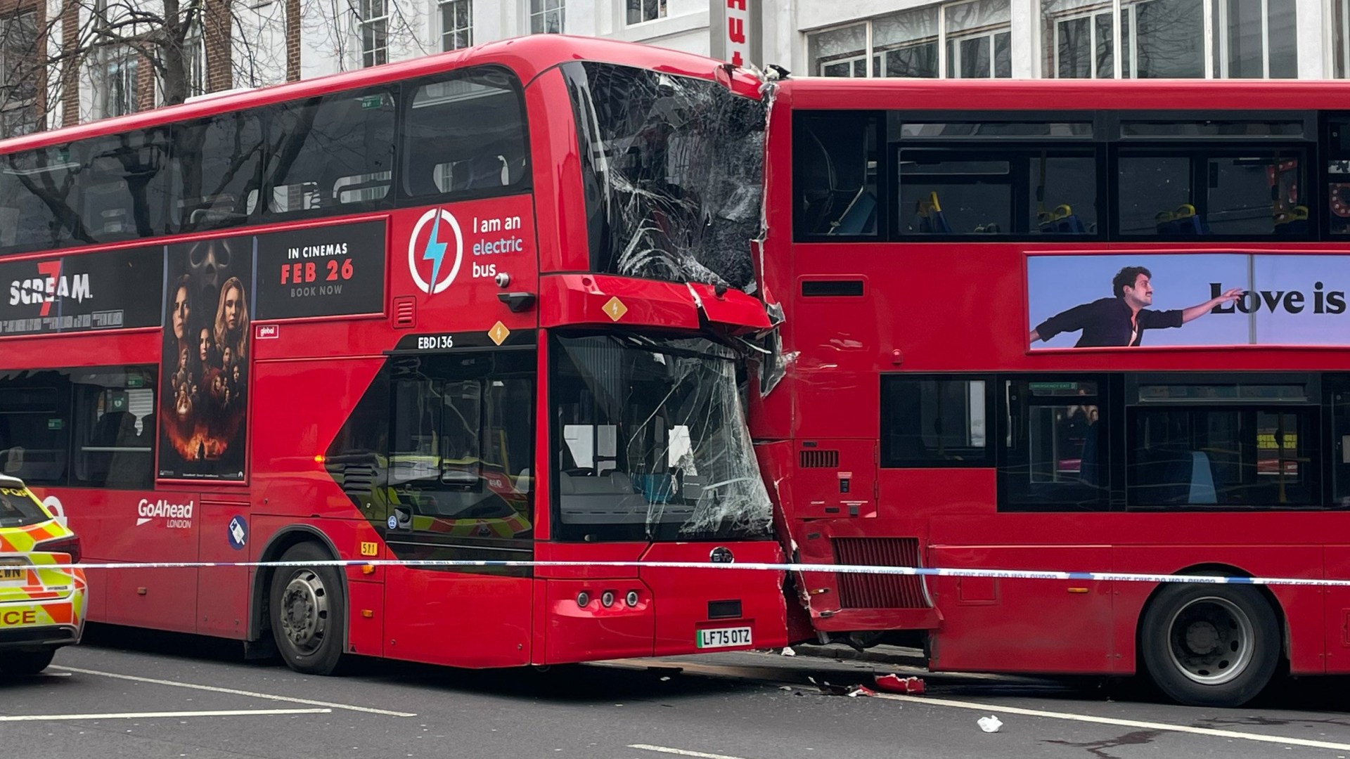 Double decker bus crashes into front of theatre leaving several people ...