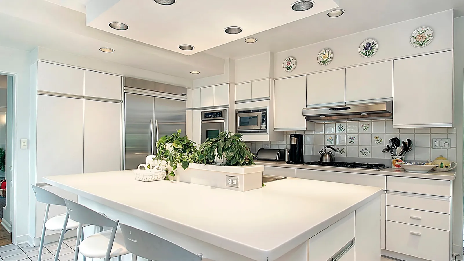 Take cabinetry to the ceiling with storage and styling tricks used by ...