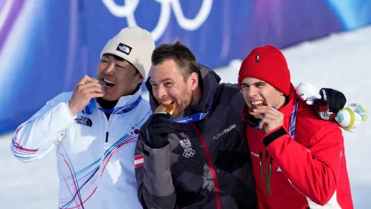 Olympic athletes biting their medals, explained: Origins, meaning and ...