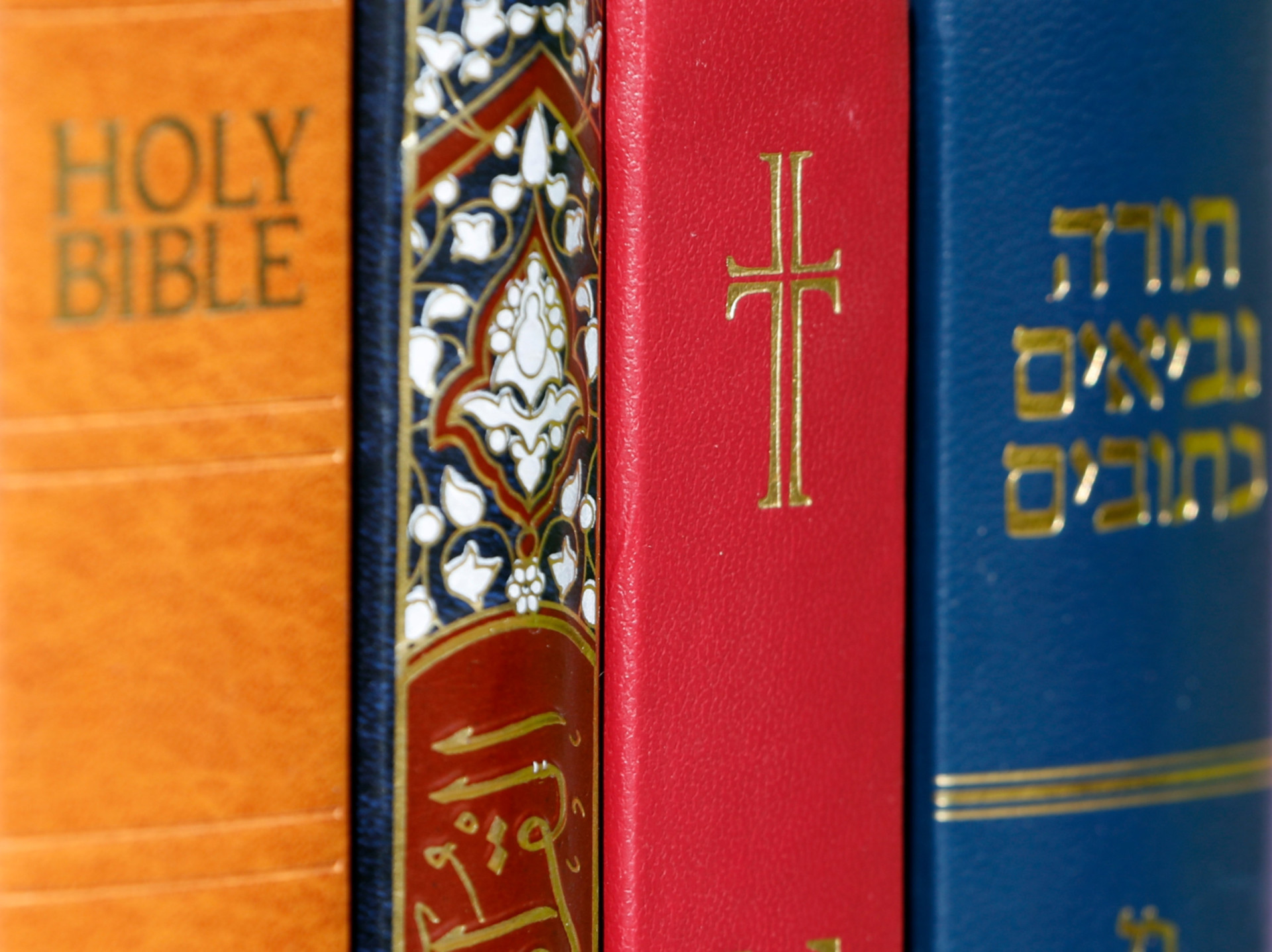 What are the key differences and similarities between the Bible and Quran?