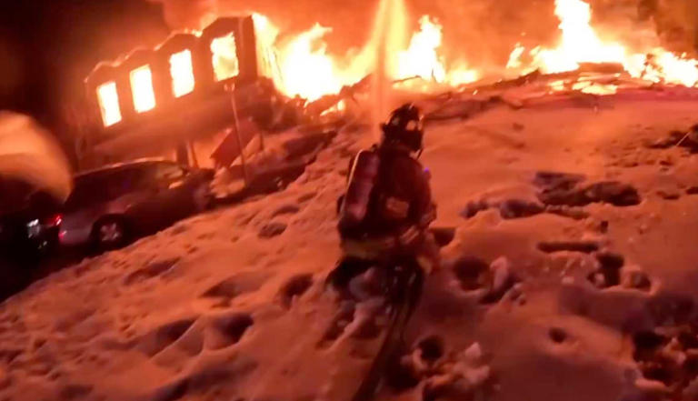 Watch: Firefighters race toward inferno after massive Virginia home ...