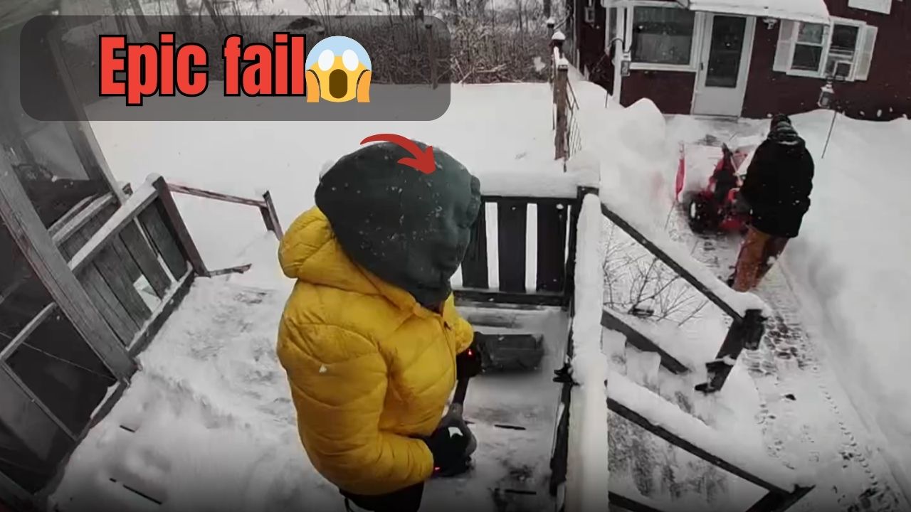 Winter struggle intensifies as woman fights through snow and slippery ...
