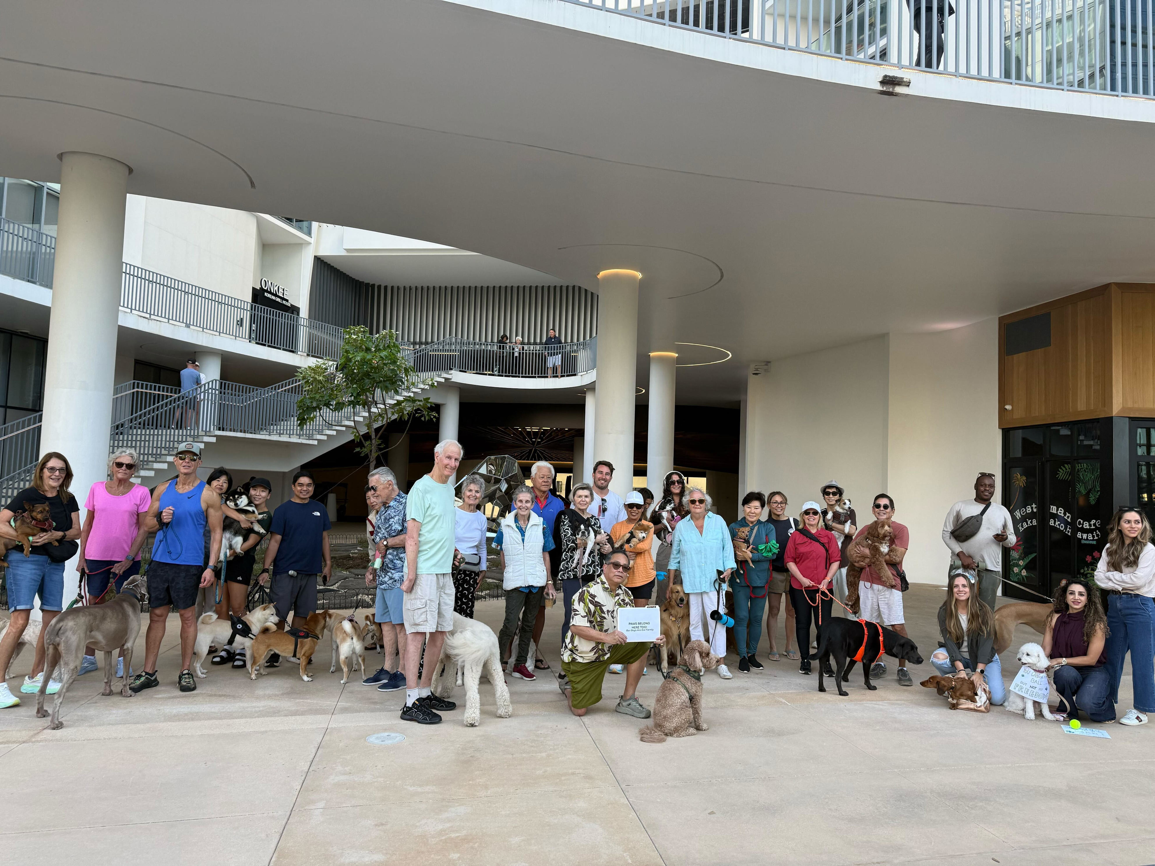 Victoria Ward Park reopens as dog owners protest new pet rules