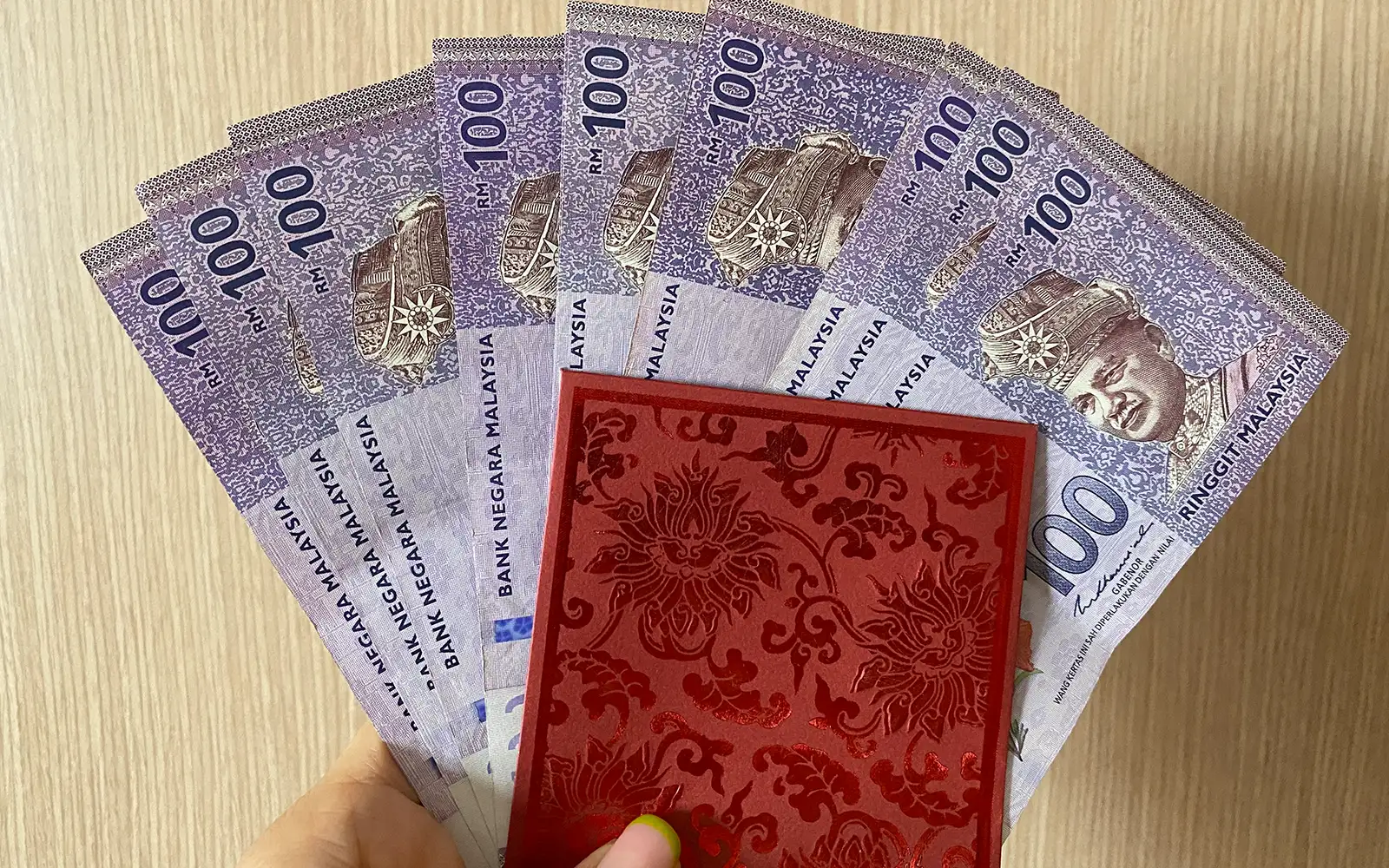 Malaysia’s unique ang pow culture: Red vs green