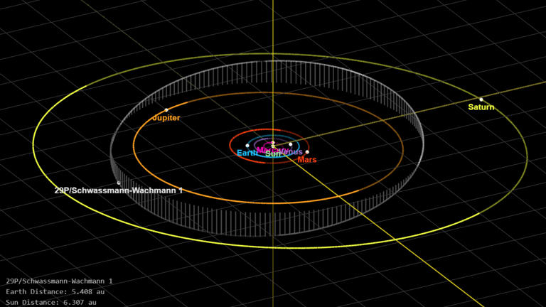 City-size, cold-volcano comet transforms into a glowing snail shell ...
