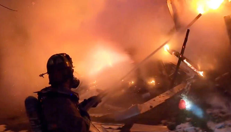 Watch: Firefighters race toward inferno after massive Virginia home ...
