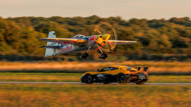 First-ever plane landing on a moving train took practice with two ...