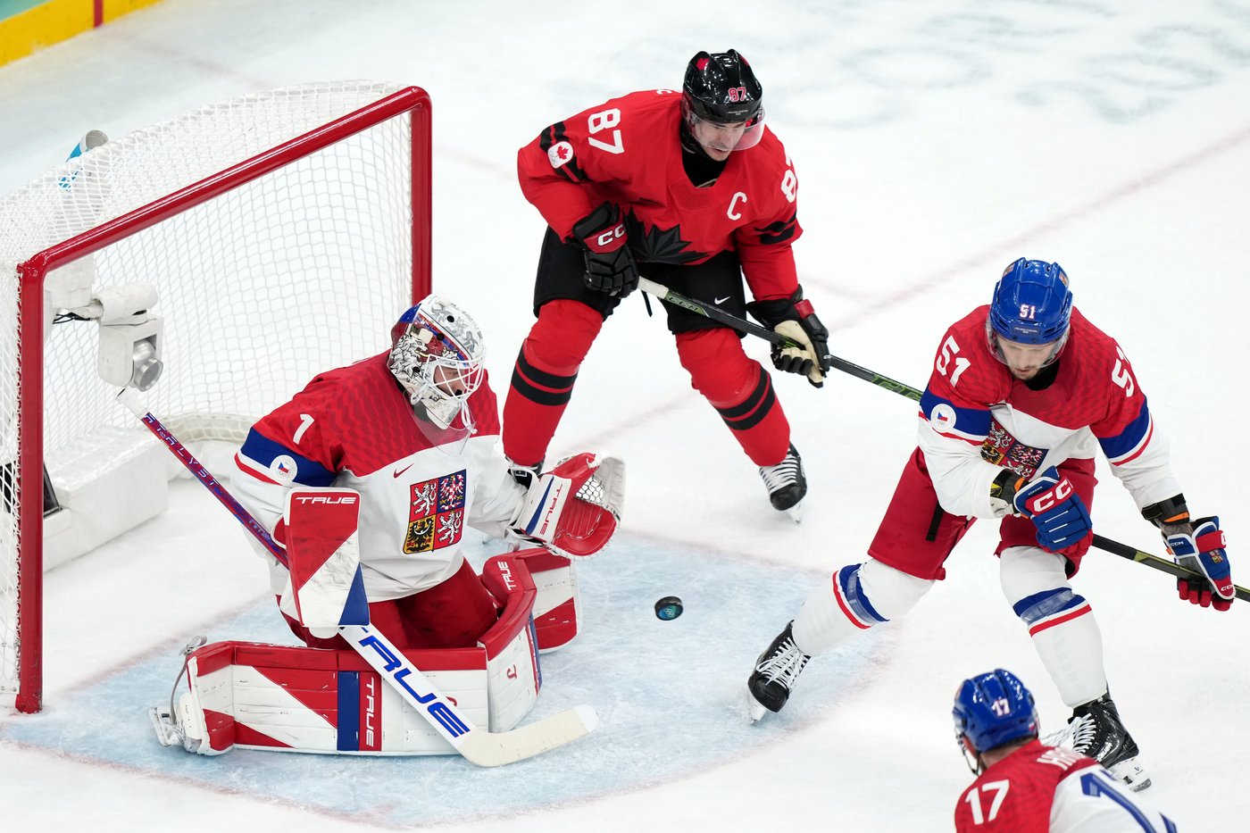 Crosby leaves game with apparent leg injury as Canada avoids early ...