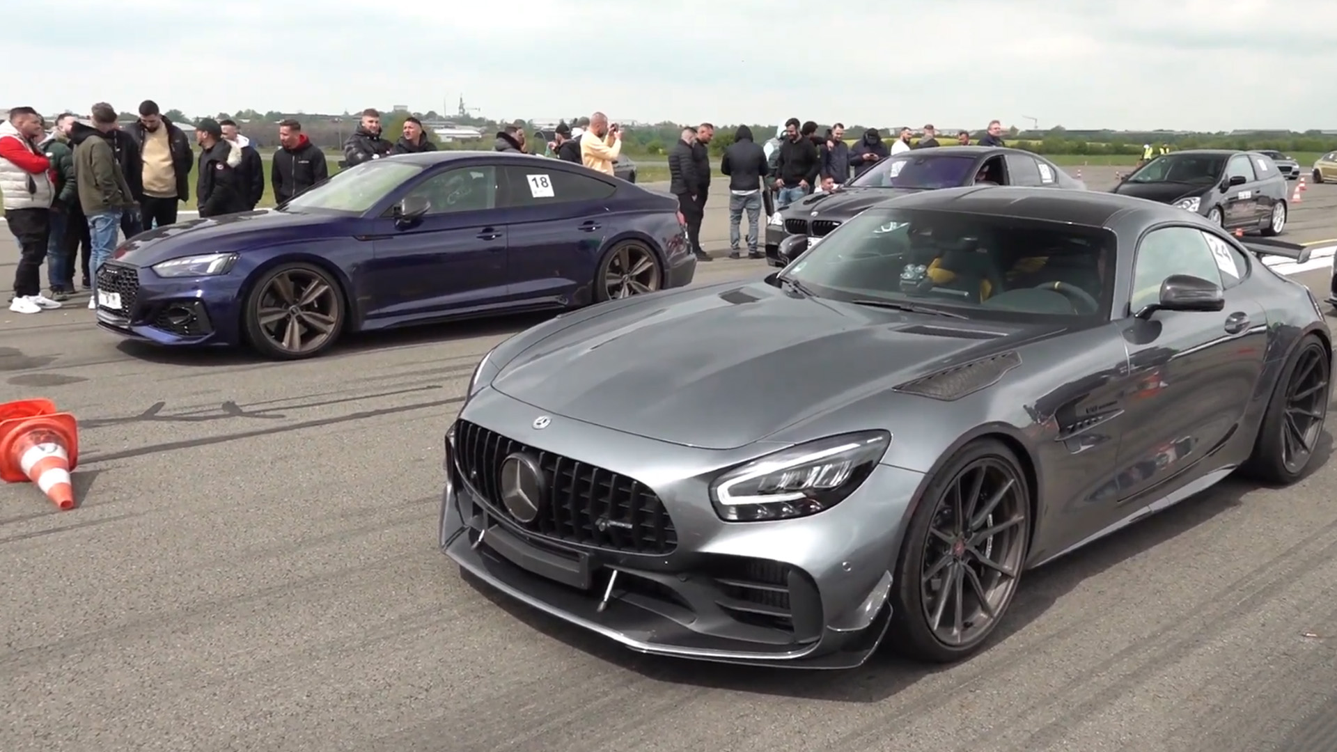 Audi RS5 Sportback vs AMG GT Pro on intense drag race showdown