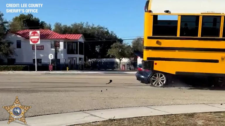 'Hard to watch': Car slams into Florida school bus, becomes wedged ...