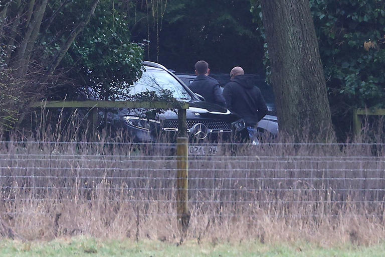 Police cars pictured at ex-Prince Andrew's Sandringham home amid his arrest