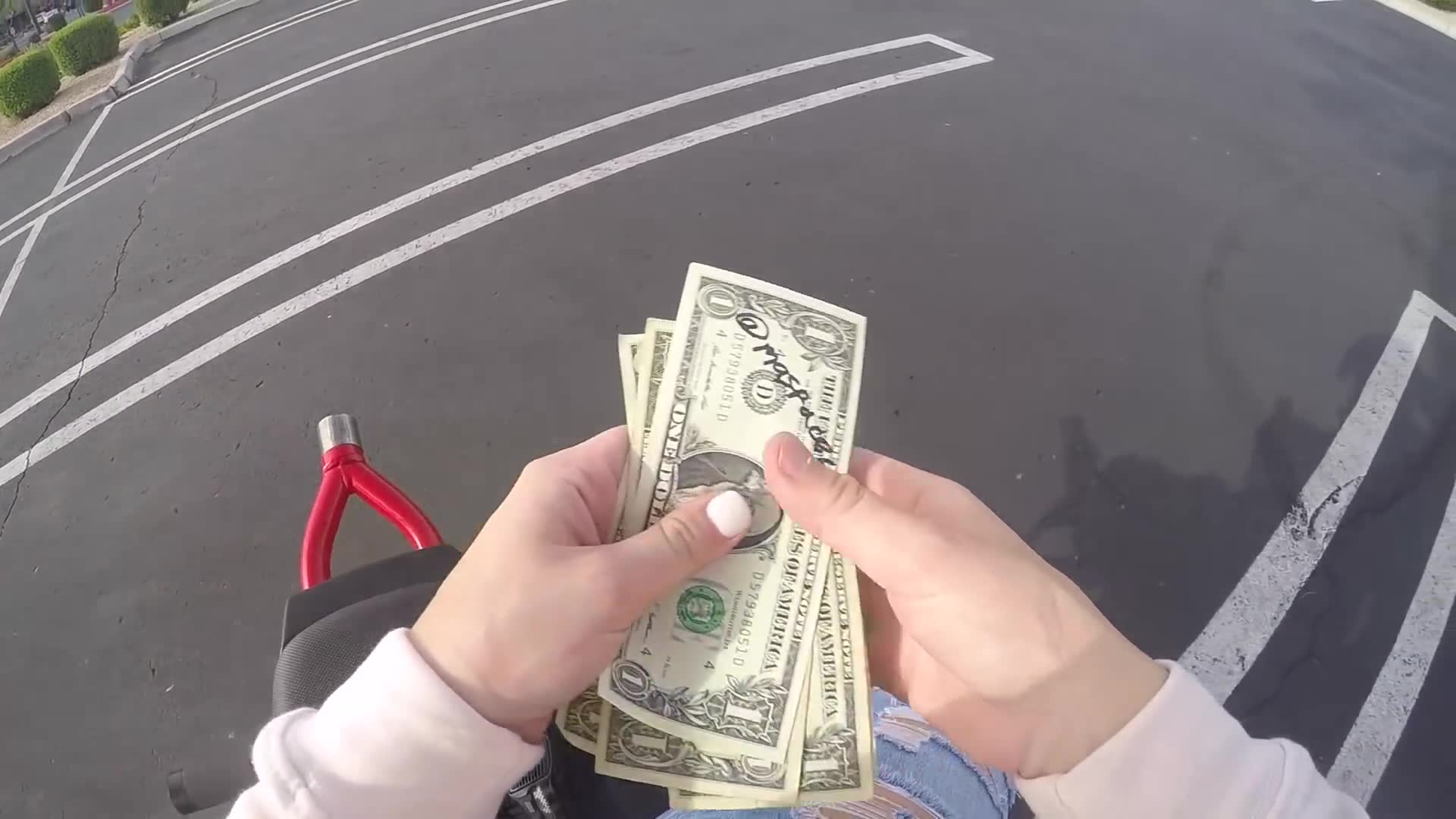 Trading single dollar bill for random items from strangers