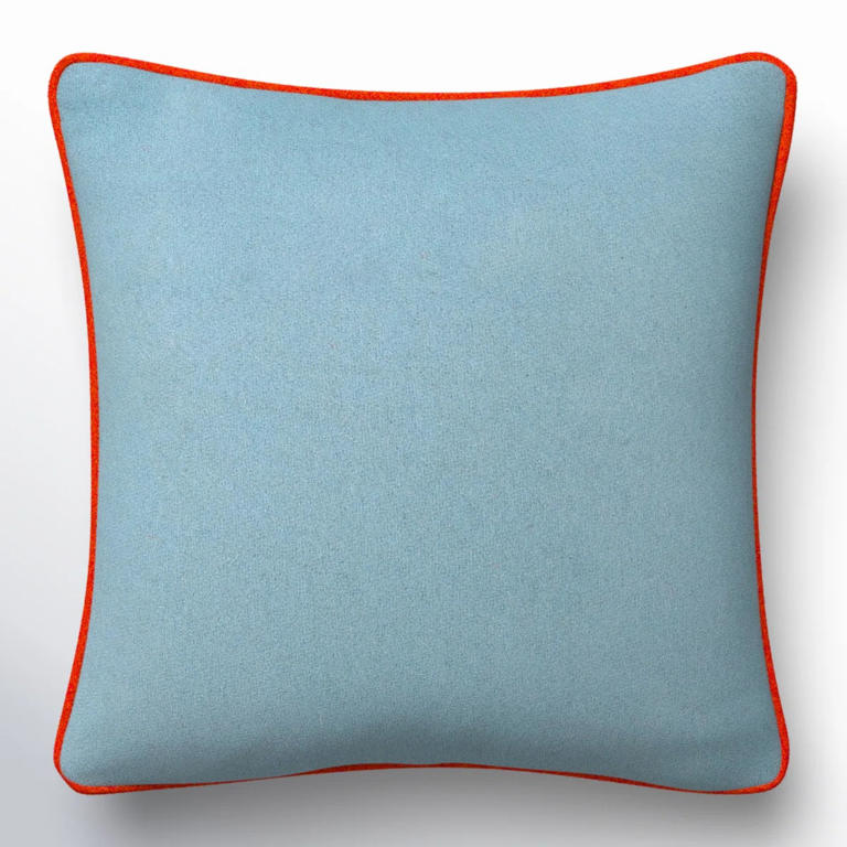 Cream sofas are fine, but Zooey Deschanel’s cerulean silhouette is ...
