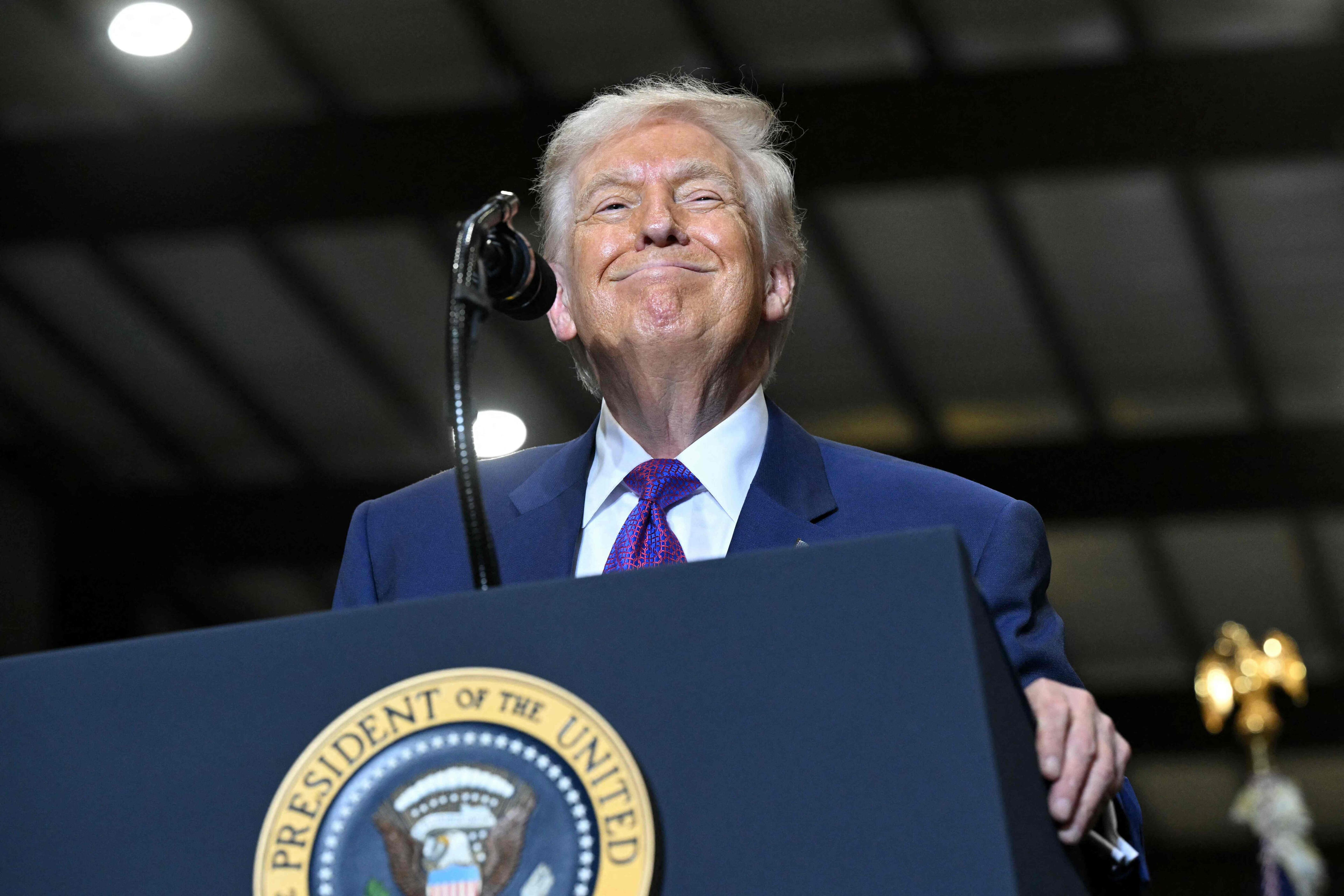 Trump touts tariffs despite record trade deficit