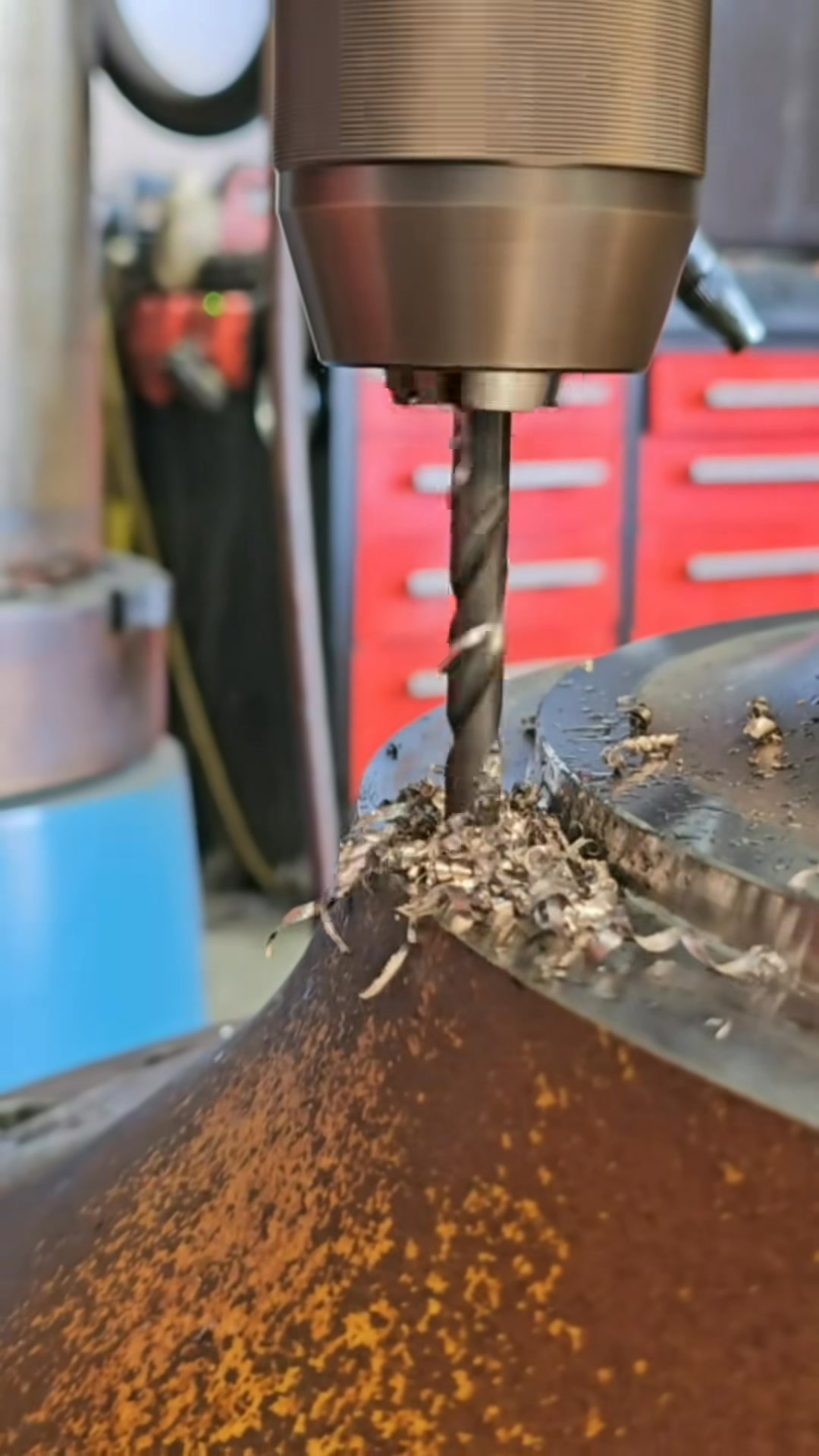 Using the radial arm drill to drill and tap the holes on the dozer ...