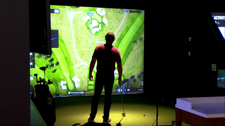 Indoor golf course in downtown Syracuse celebrates opening with ...